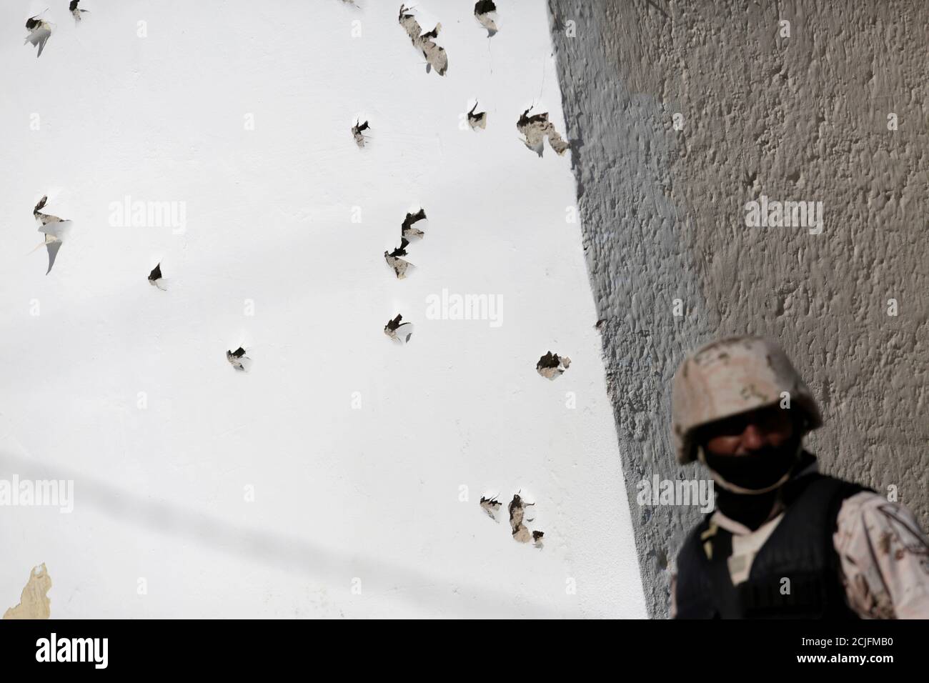 Bullet riddled house hi-res stock photography and images - Alamy