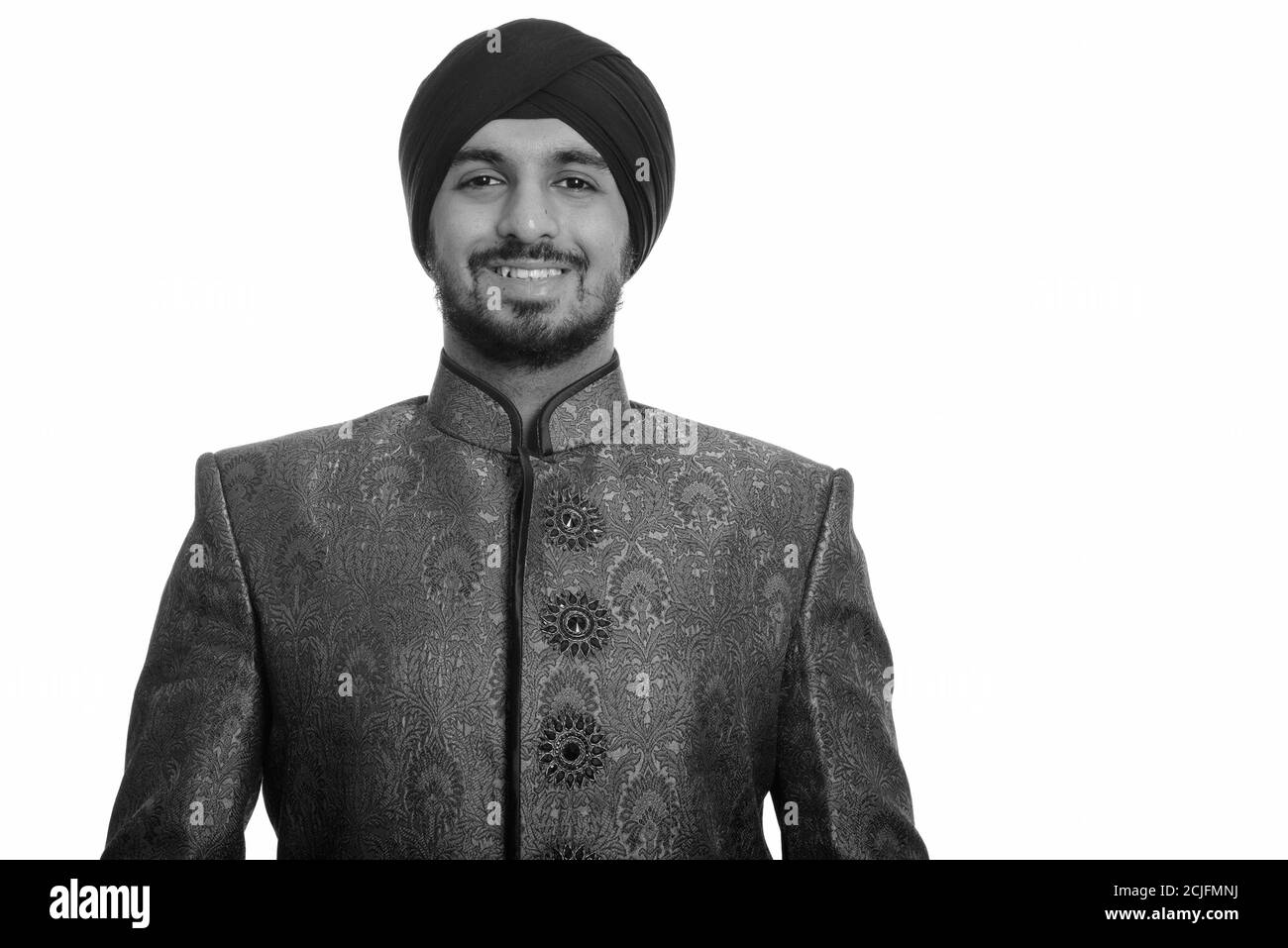 Young happy Indian Sikh man smiling wearing traditional clothes Stock ...