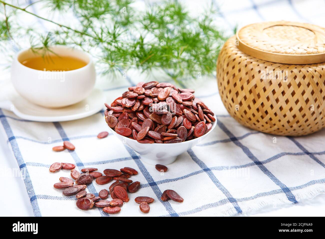 Red melon seeds Stock Photo - Alamy