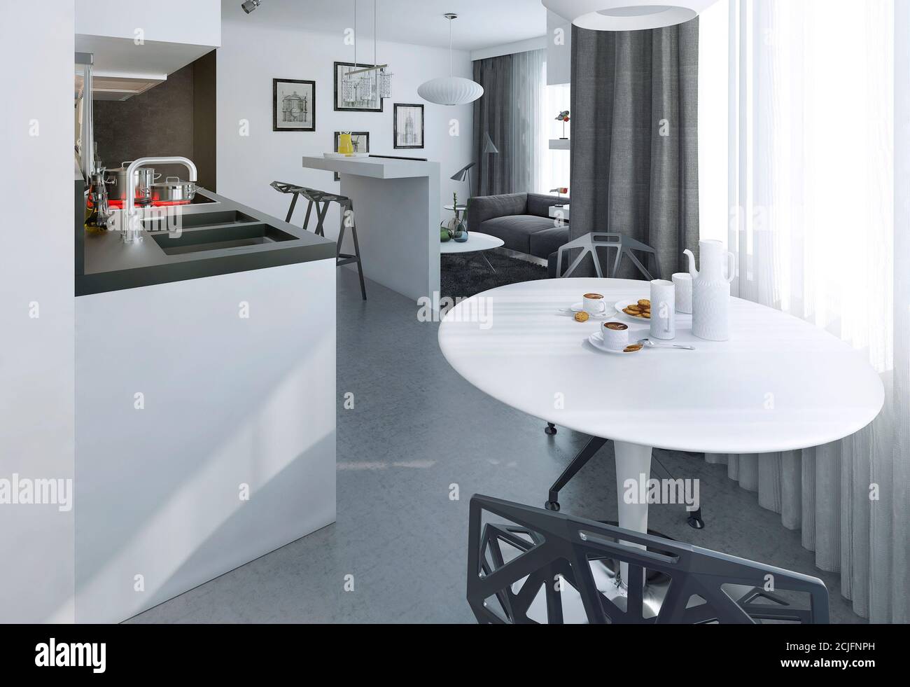 Contemporary dining area with table and two designer chairs in the ...