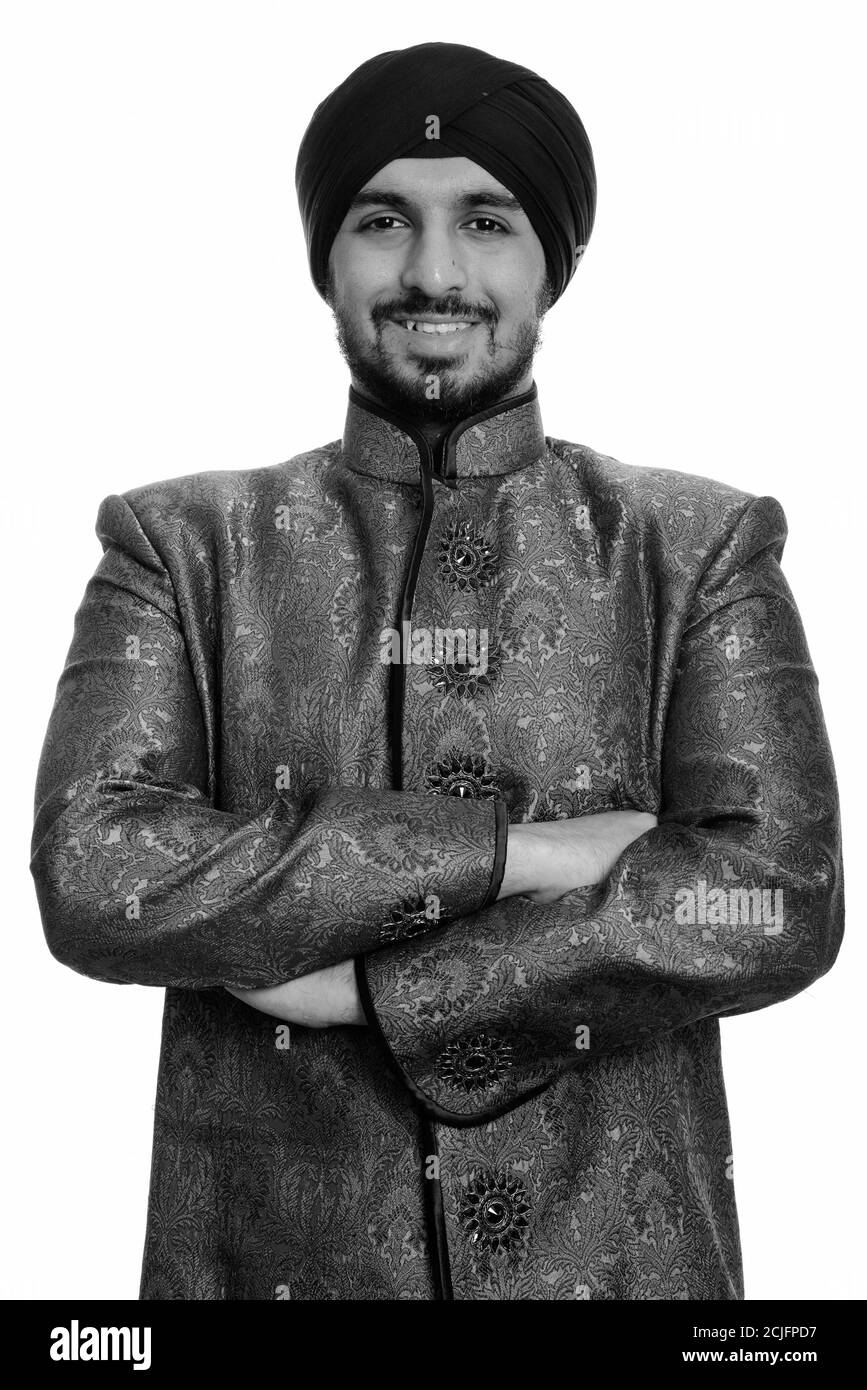 Young happy Indian Sikh man smiling wearing traditional clothes Stock ...