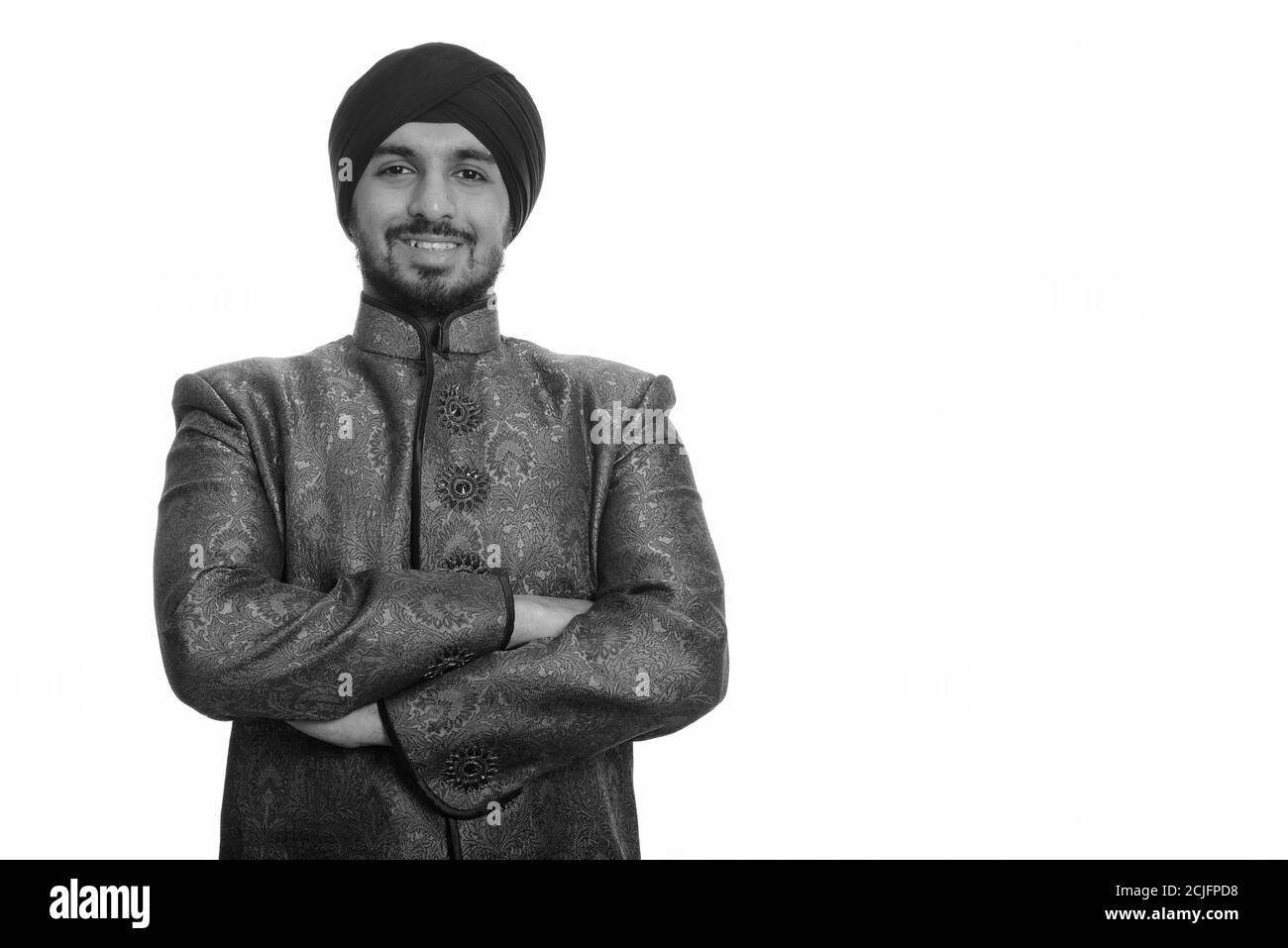 Young happy Indian Sikh man smiling wearing traditional clothes Stock ...