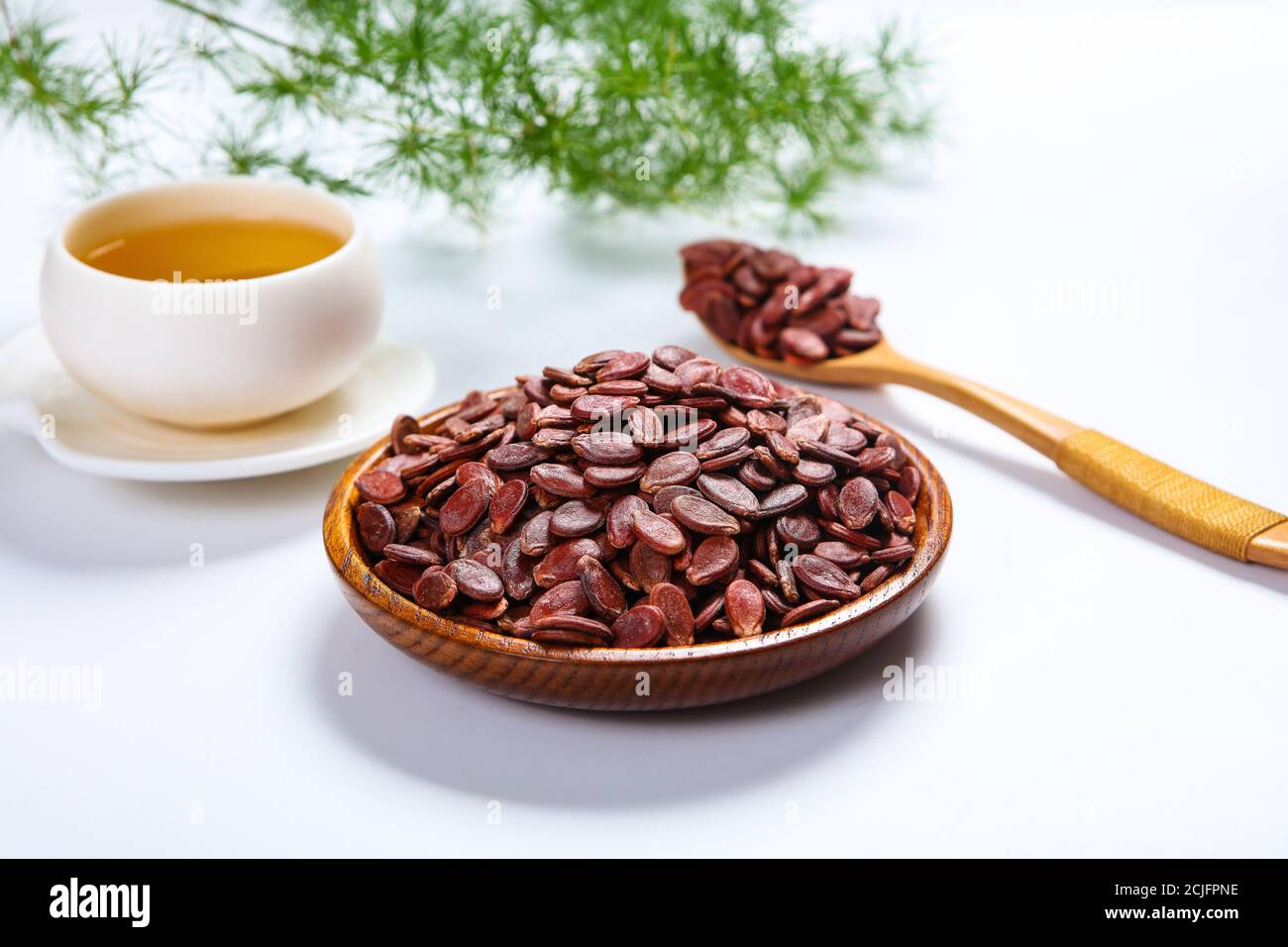Red melon seeds Stock Photo - Alamy
