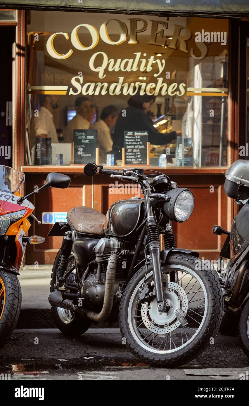 Shop front and motorbike hi-res stock photography and images - Alamy
