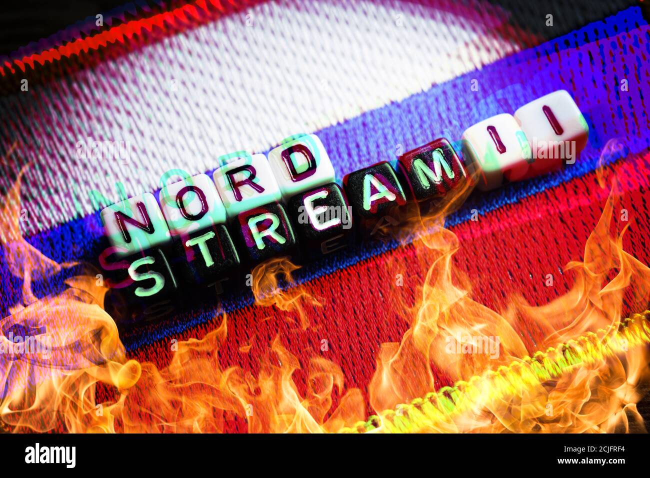 Letter cubes forming the words Nord Stream 2 on the flag of Russia ...