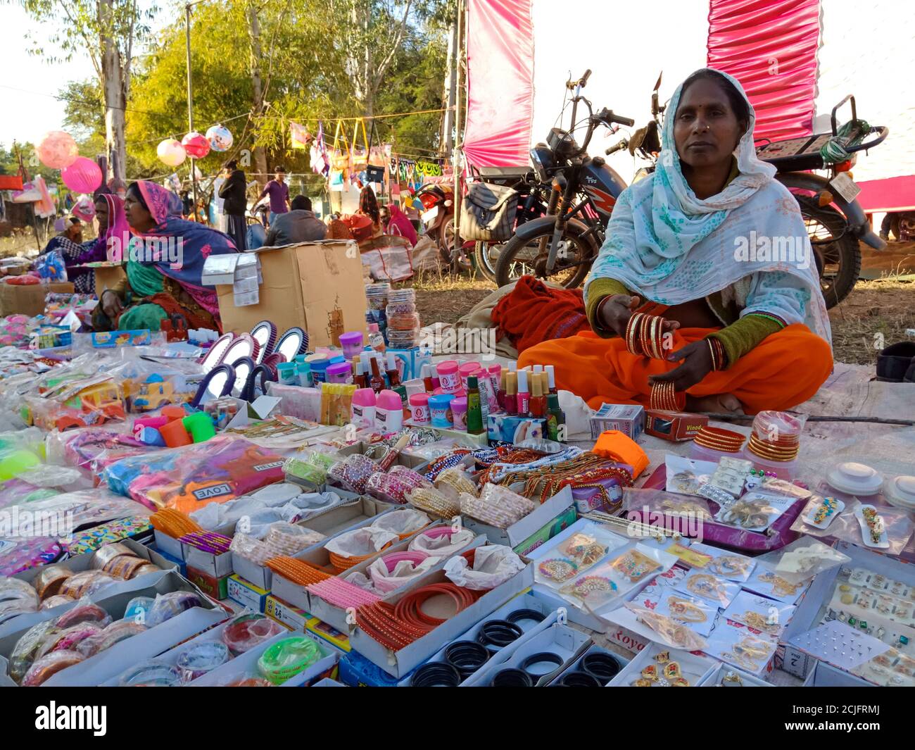 DISTRICT KATNI, INDIA - FEBRUARY 02, 2020: Indian village woman selling ...