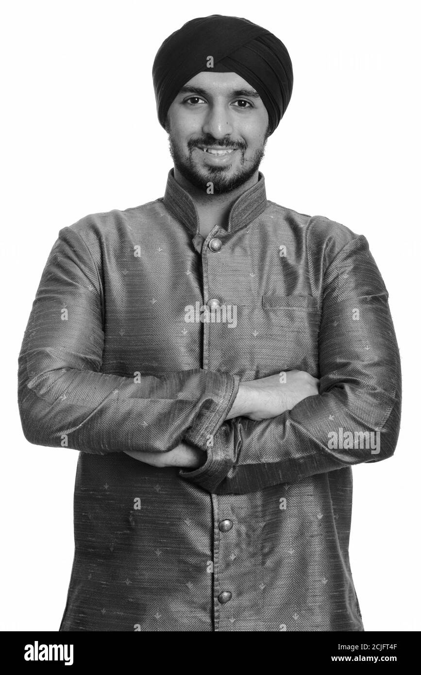 Young happy Indian Sikh man smiling wearing traditional clothes Stock ...