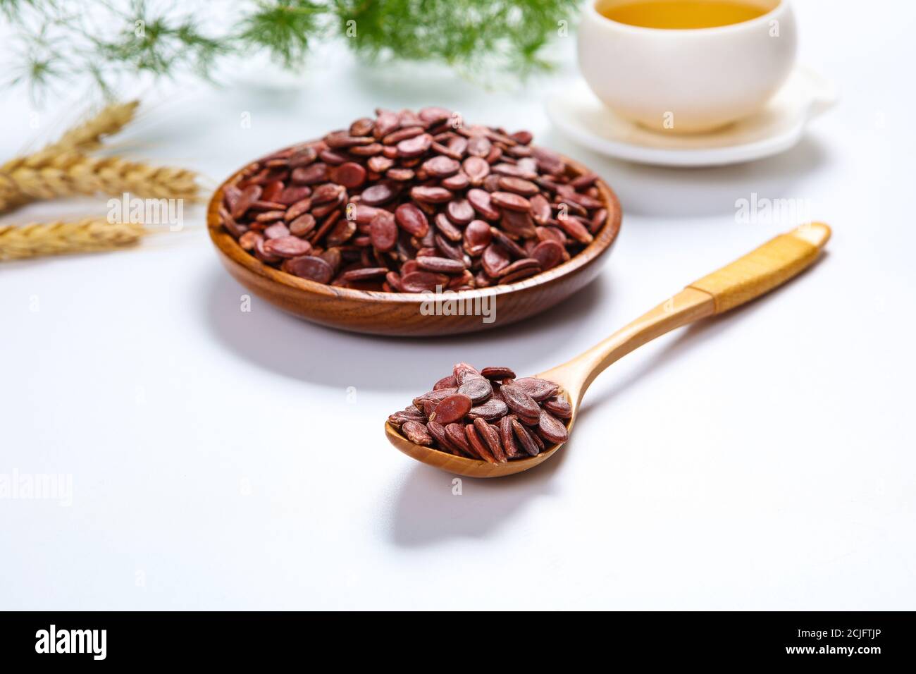 Red melon seeds Stock Photo - Alamy