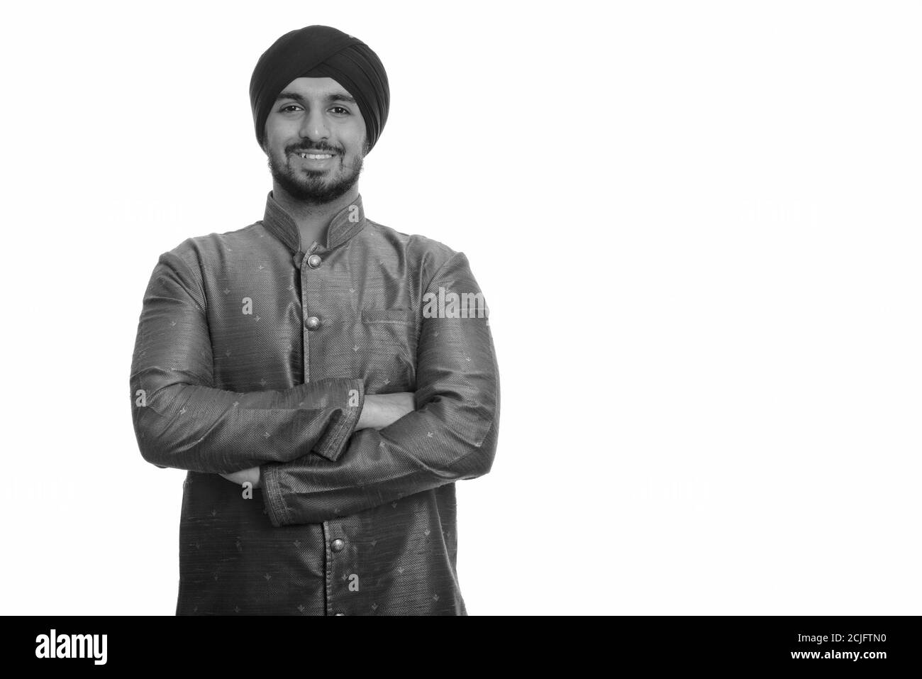 Young happy Indian Sikh man smiling wearing traditional clothes Stock ...