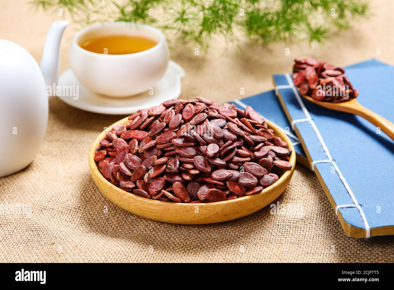 Red melon seeds Stock Photo - Alamy