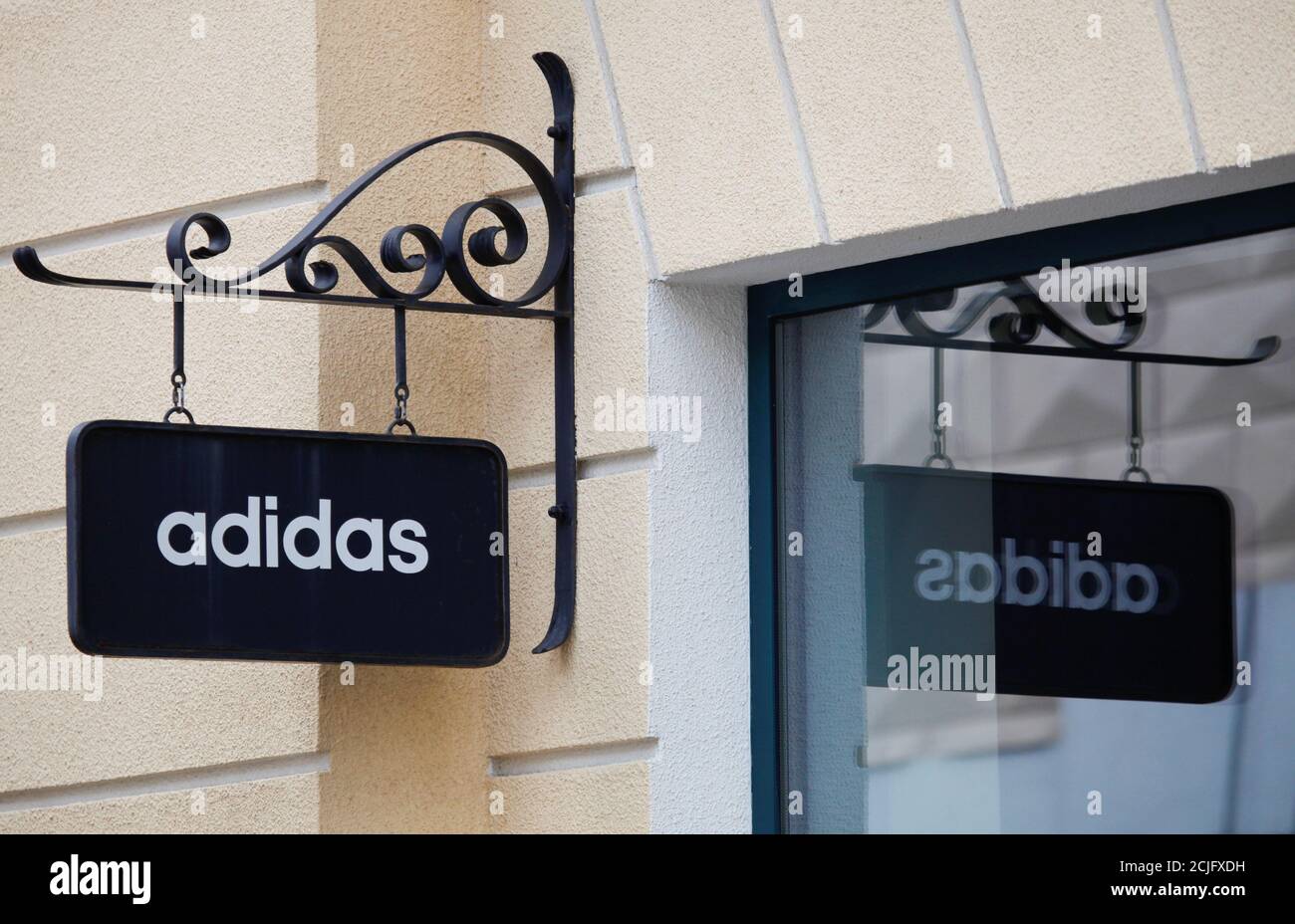 Adidas store logo hi-res stock photography and images - Alamy