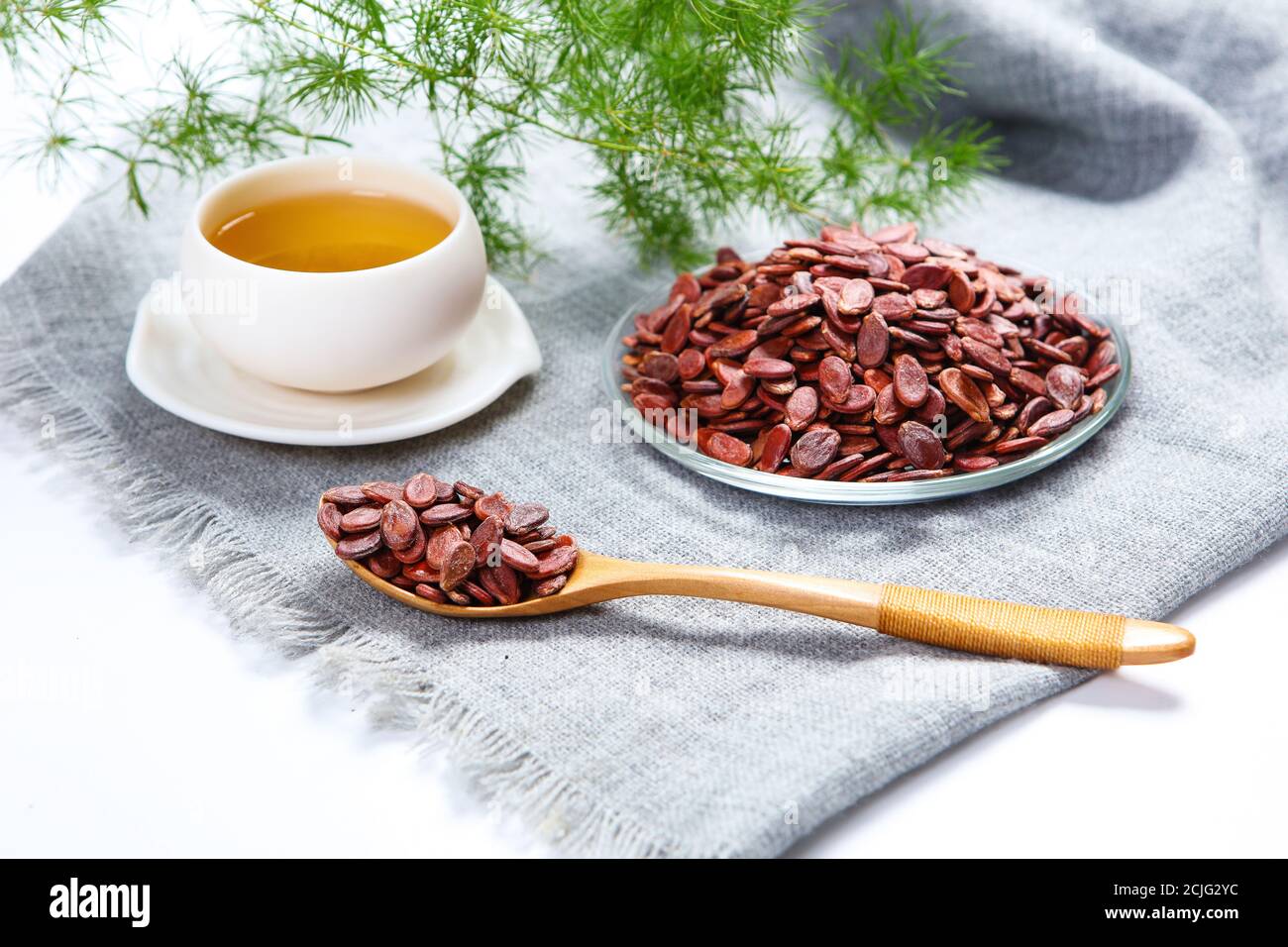 Red melon seeds Stock Photo - Alamy
