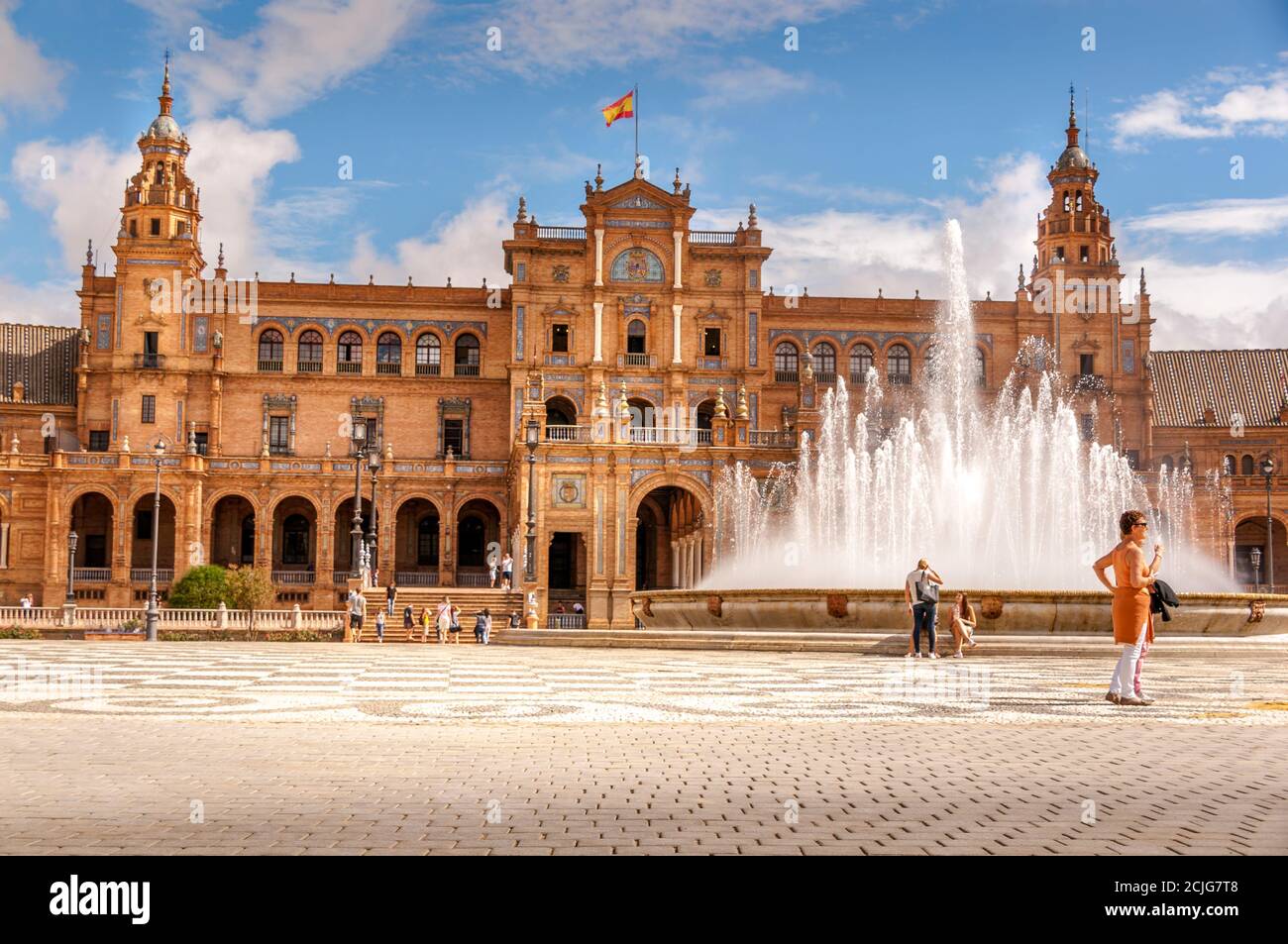 SEVILLE, SPAIN - JUNE Circa, 2020. A few people walking near fountain ...
