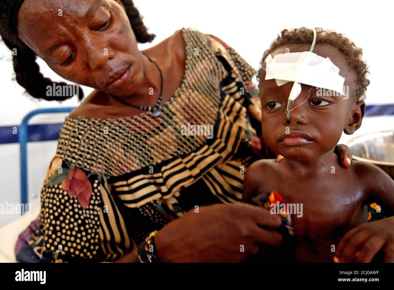 Starving mother and children hi-res stock photography and images - Alamy