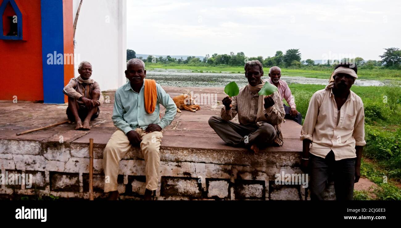 DISTRICT KATNI, INDIA - AUGUST 03, 2019: Group of village poor people ...
