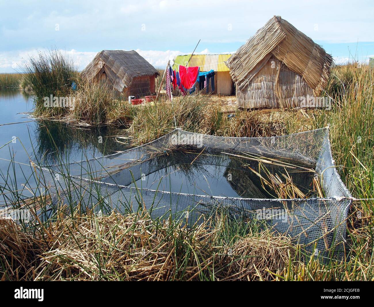 Fishing village on Uros floating islands, lake Titicaca, Peru Stock ...
