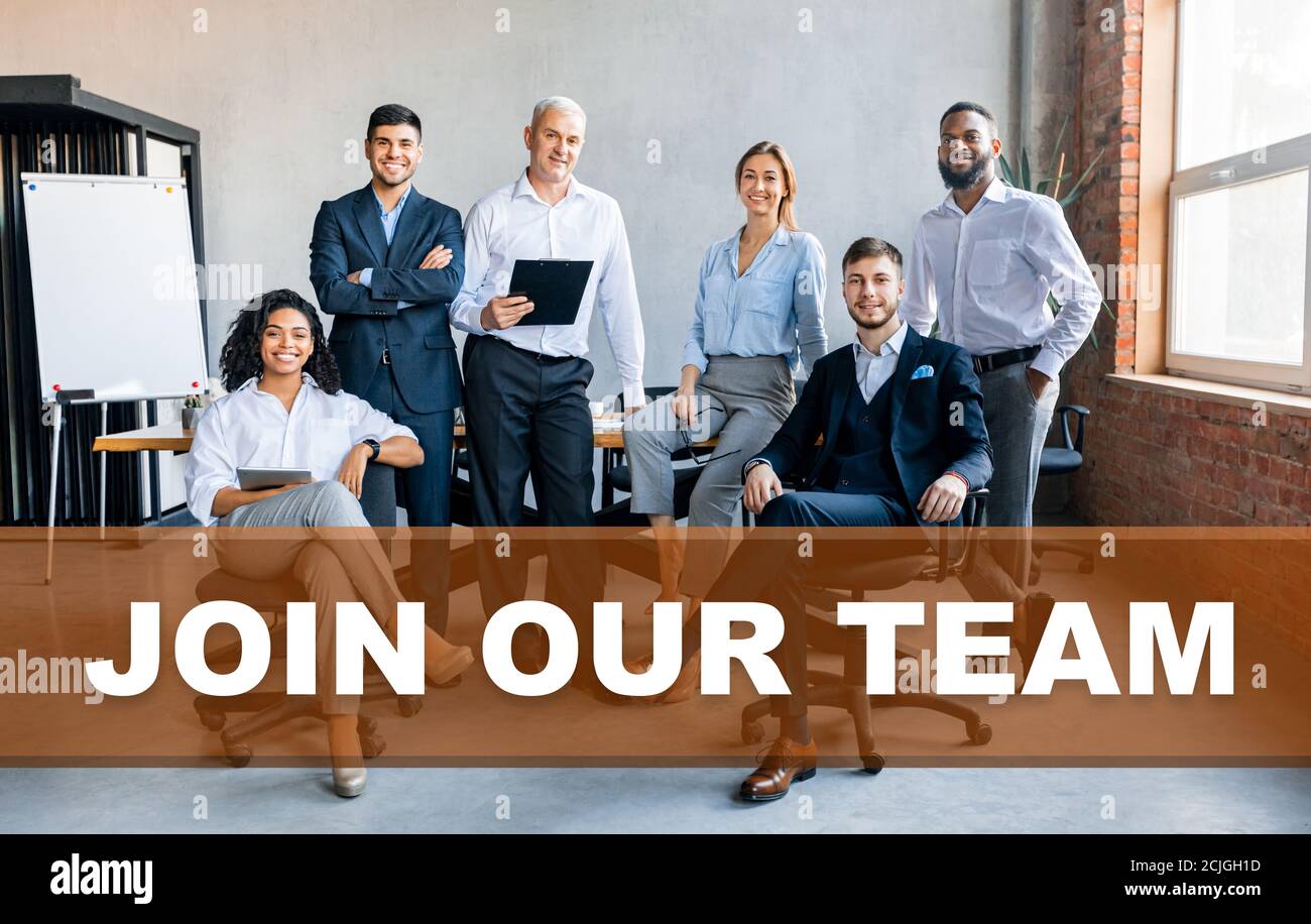 Employment Concept. Successful Business Team Posing At Workplace In ...