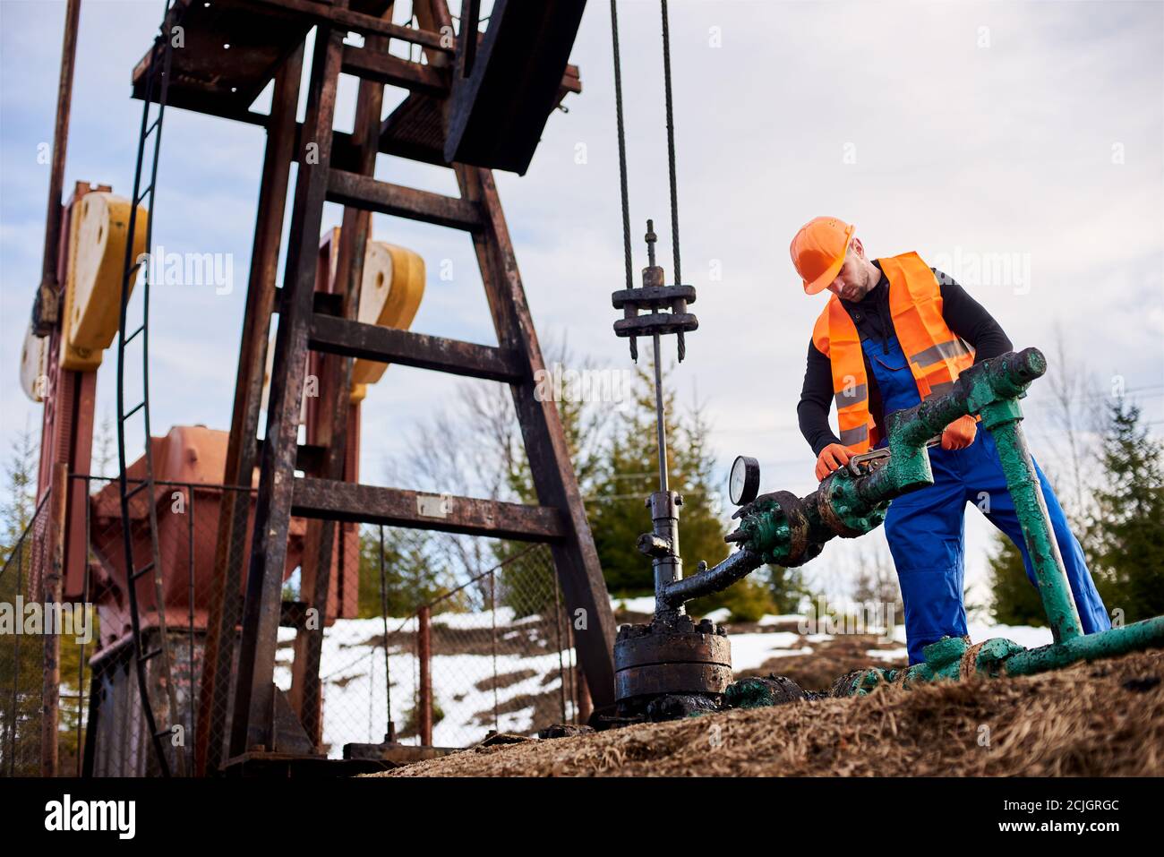 Oil rig worker helmet hi-res stock photography and images - Alamy