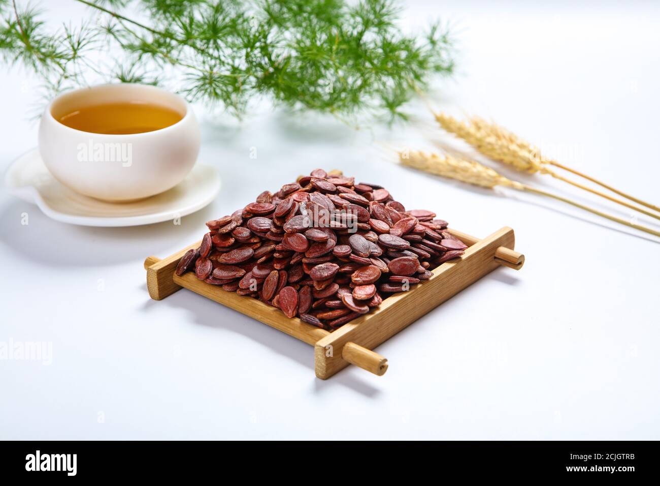 Red melon seeds Stock Photo - Alamy