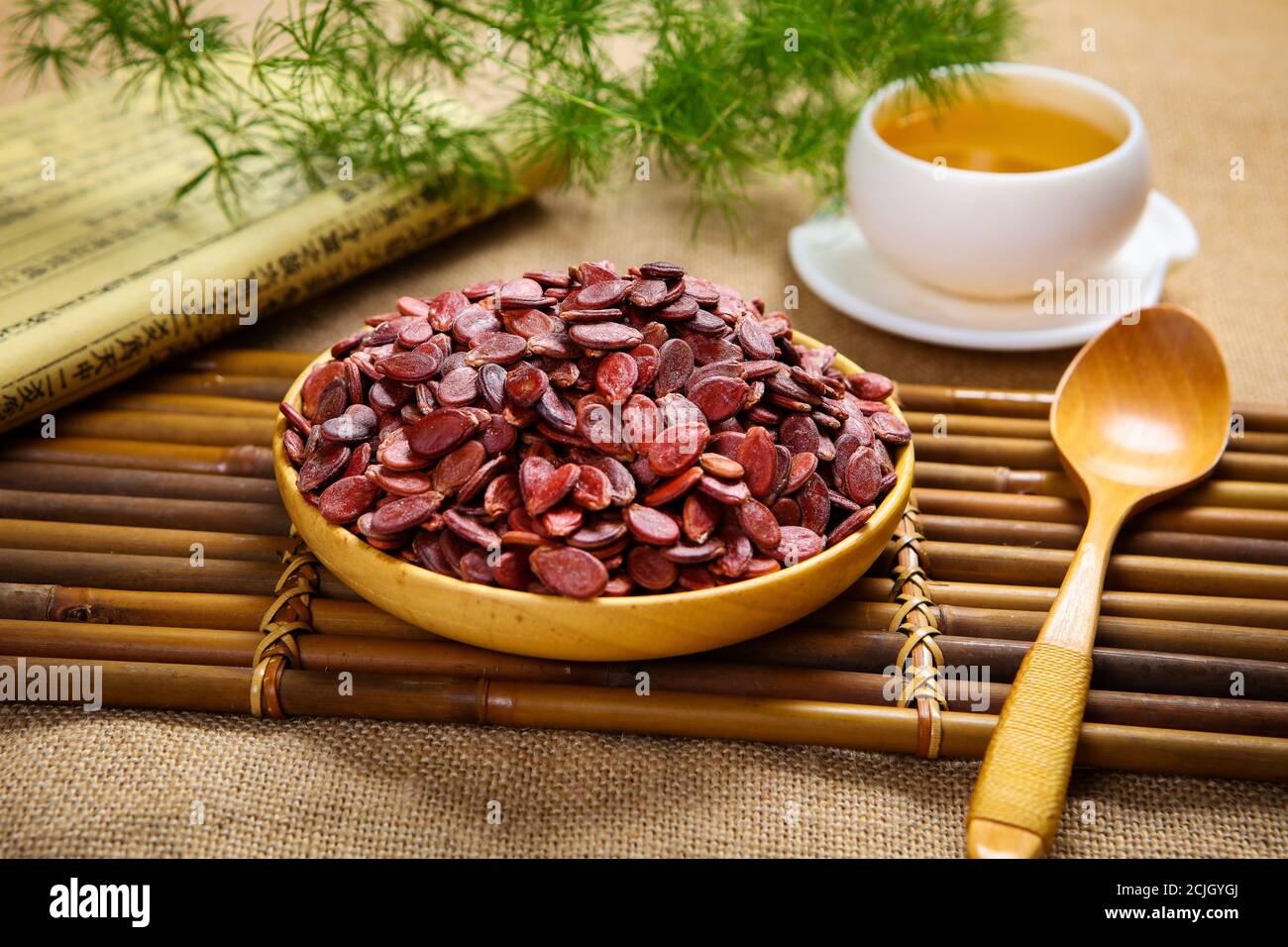 Red melon seeds Stock Photo - Alamy