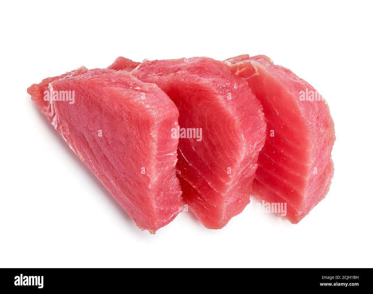 Three tuna steaks isolated on white background. Top view of slices of ...