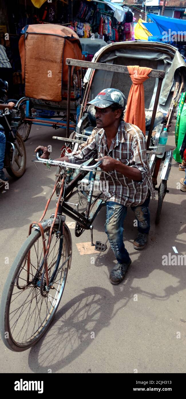 DISTRICT KATNI, INDIA - AUGUST 07, 2019: Indian rickshaw rider ...