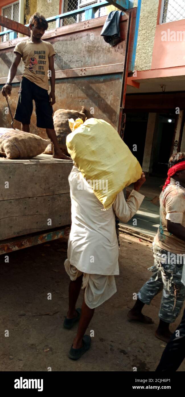Man Carrying Sack On His Back High Resolution Stock Photography and ...