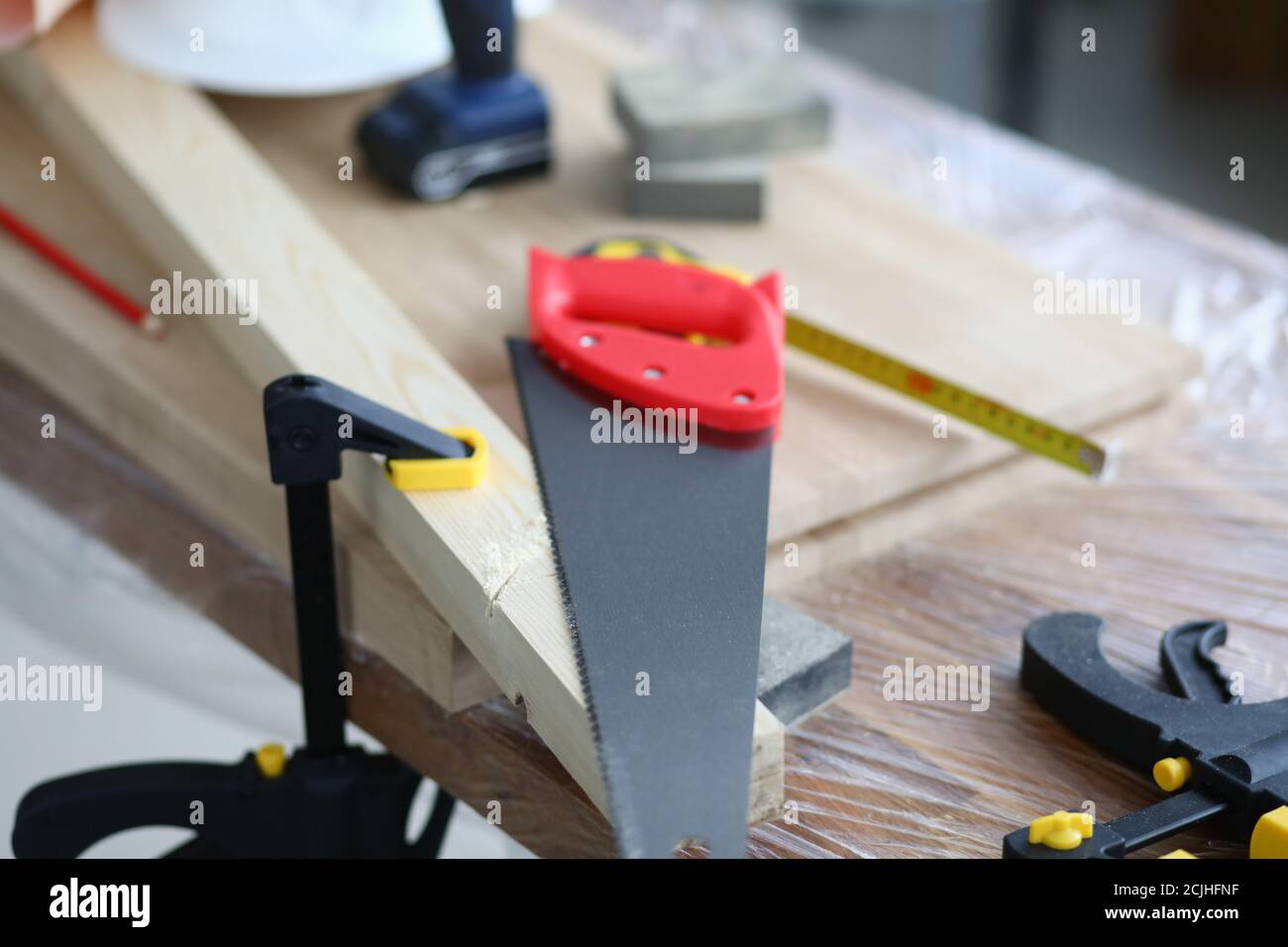 Workbench with wooden blocks and carpentry tools Stock Photo - Alamy