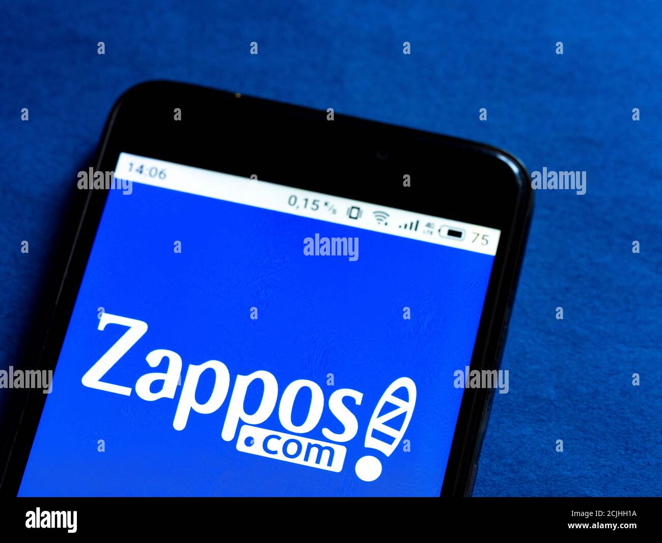 In this photo illustration a Zappos logo is seen displayed on a ...