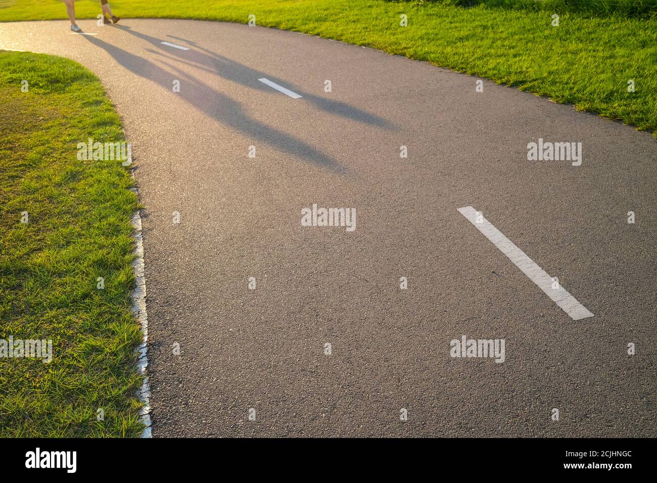 Shadows two people walking hi-res stock photography and images - Alamy