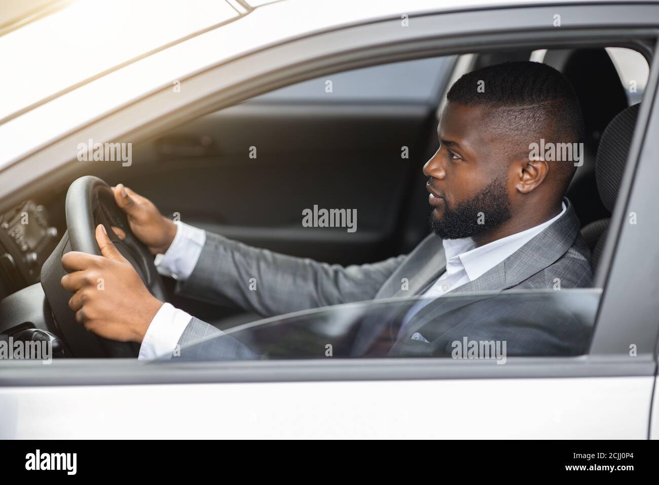 Man Driving Car Side View