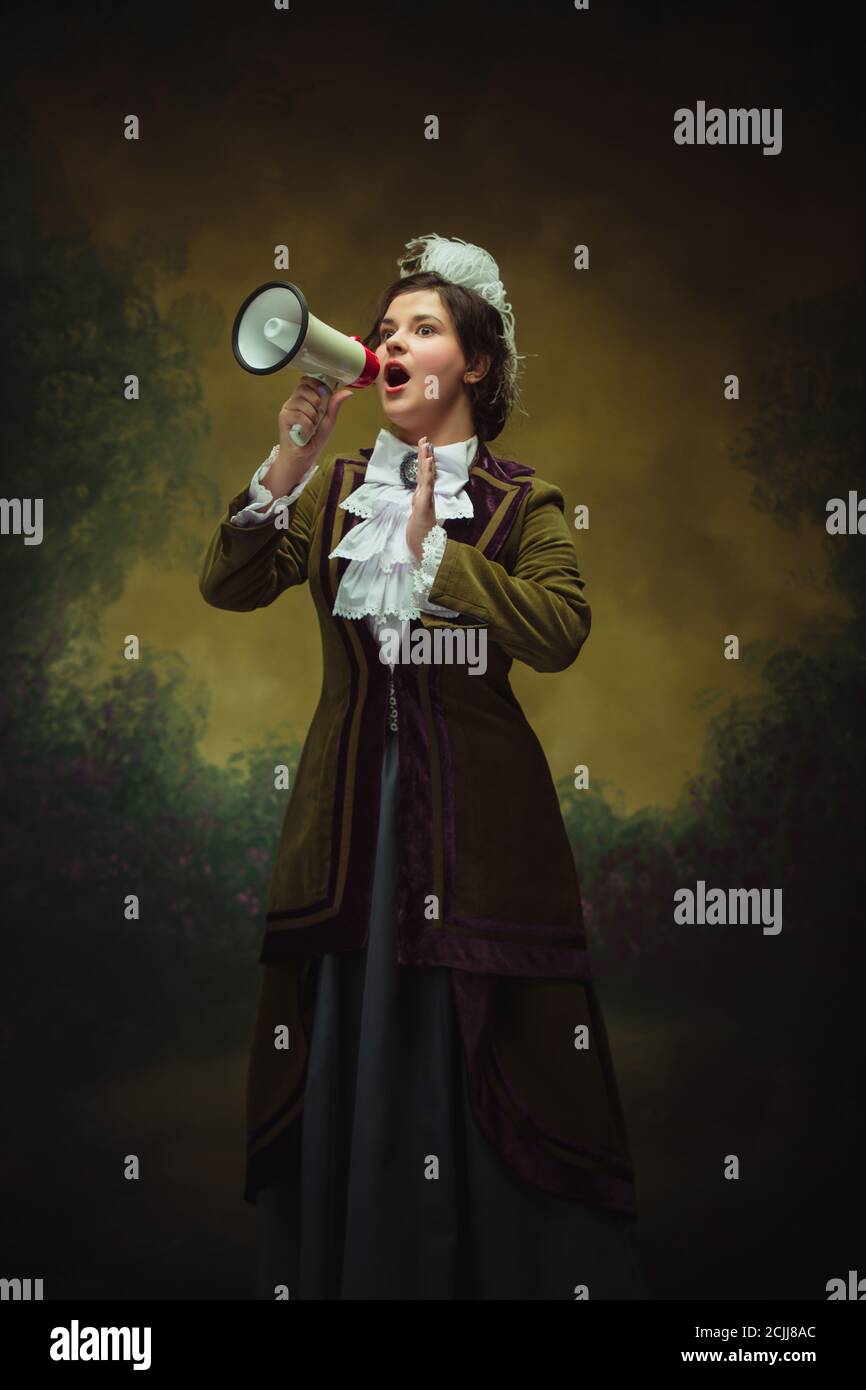 Shouting for sales. Modern trendy look, portrait of renaissance period ...