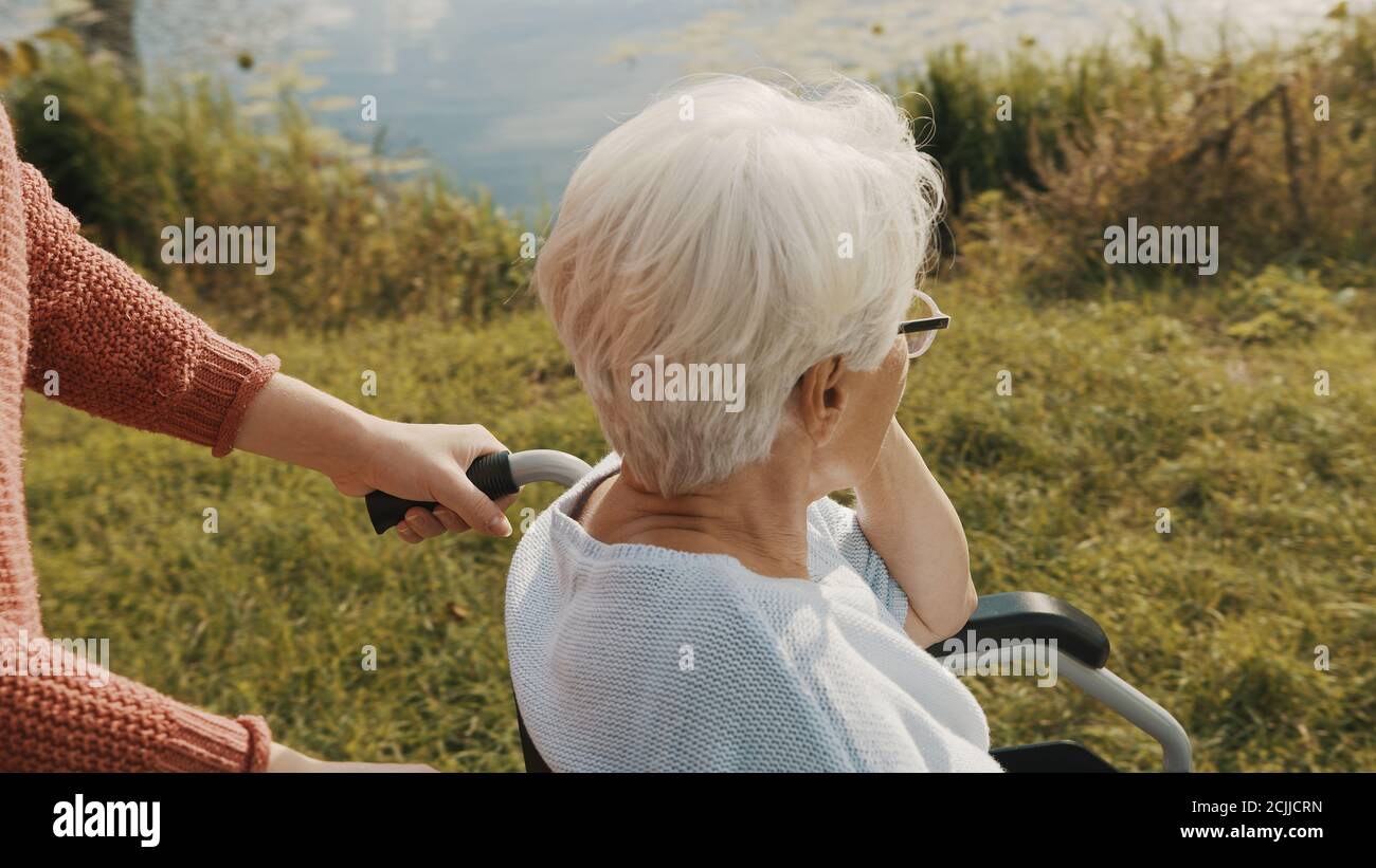 Elderly Lady In Wheelchair Carer High Resolution Stock Photography and ...