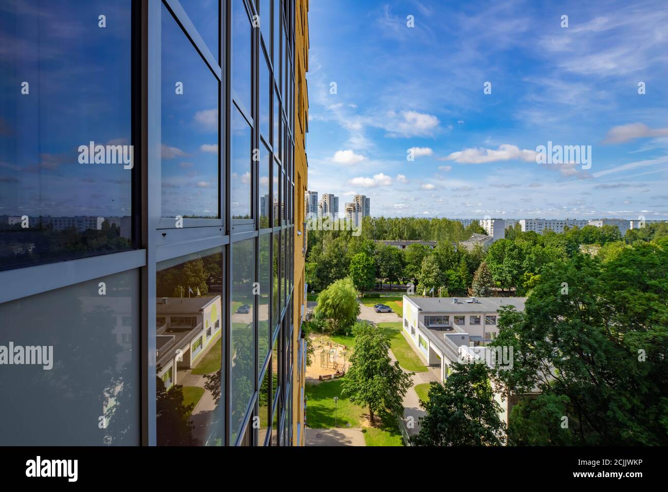 Top view from window of city at sunny summer day. Modern exterior of ...