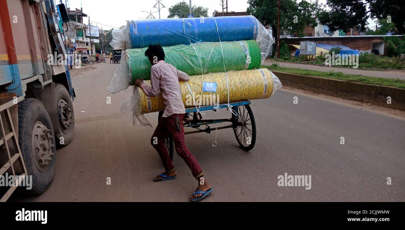 DISTRICT KATNI, INDIA - SEPTEMBER 18, 2019: An indian poor male labor ...