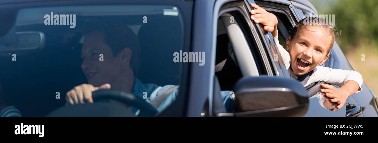 Smiling through car windows hi-res stock photography and images - Alamy