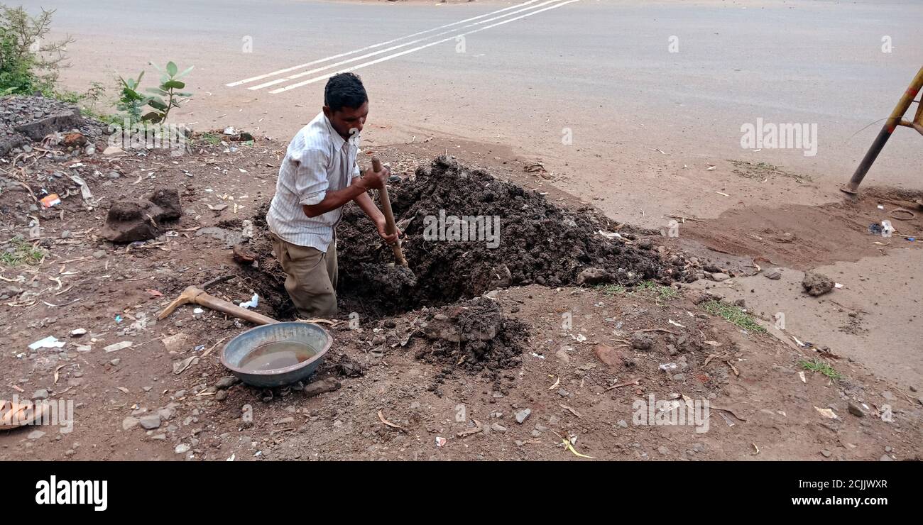 DISTRICT KATNI, INDIA - SEPTEMBER 18, 2019: An indian poor labor ...