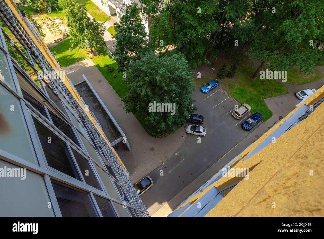 Top view from window of car parking at sunny summer day. Modern ...
