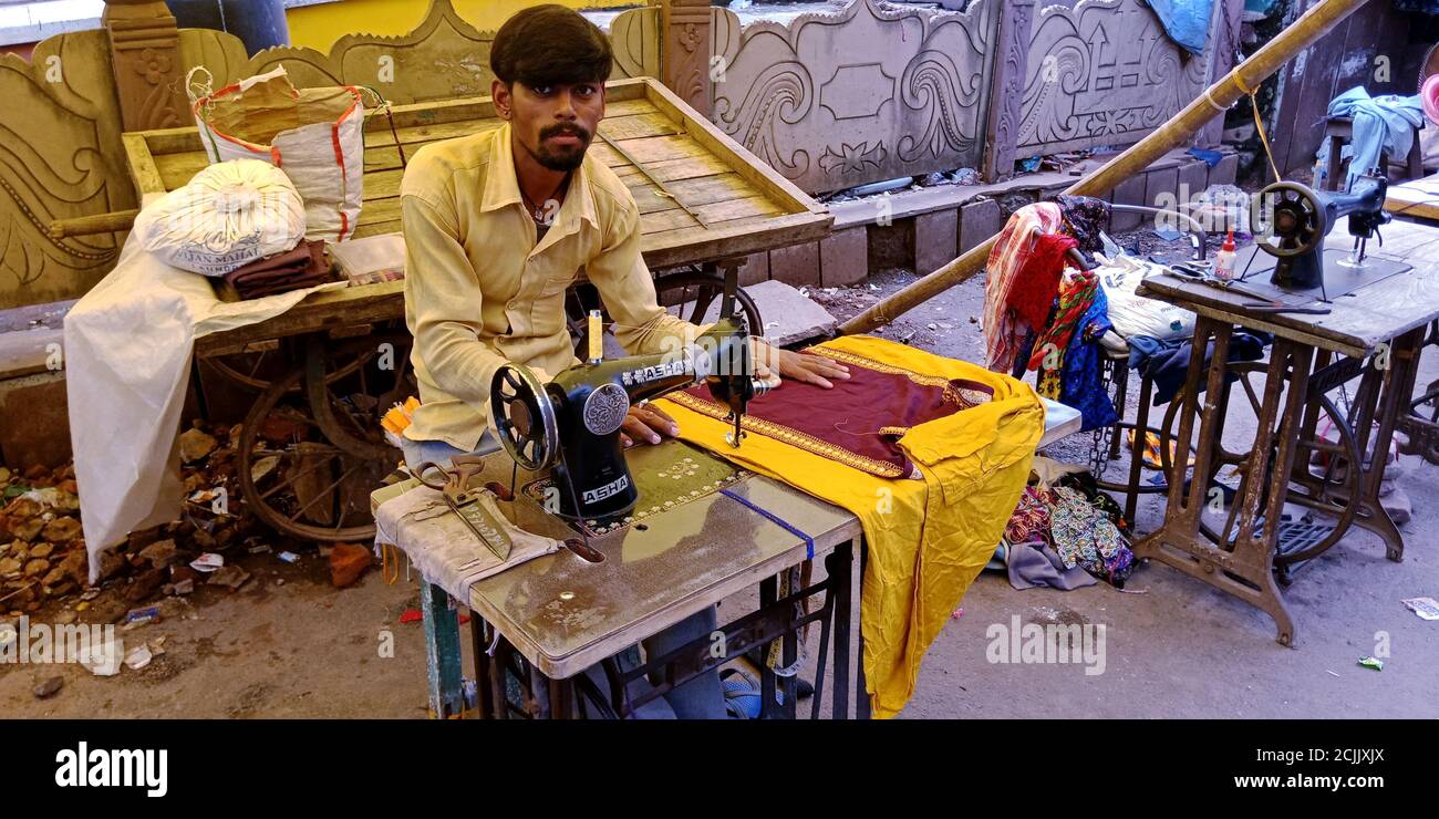 Indian tailor traditional sewing machine hi-res stock photography and ...