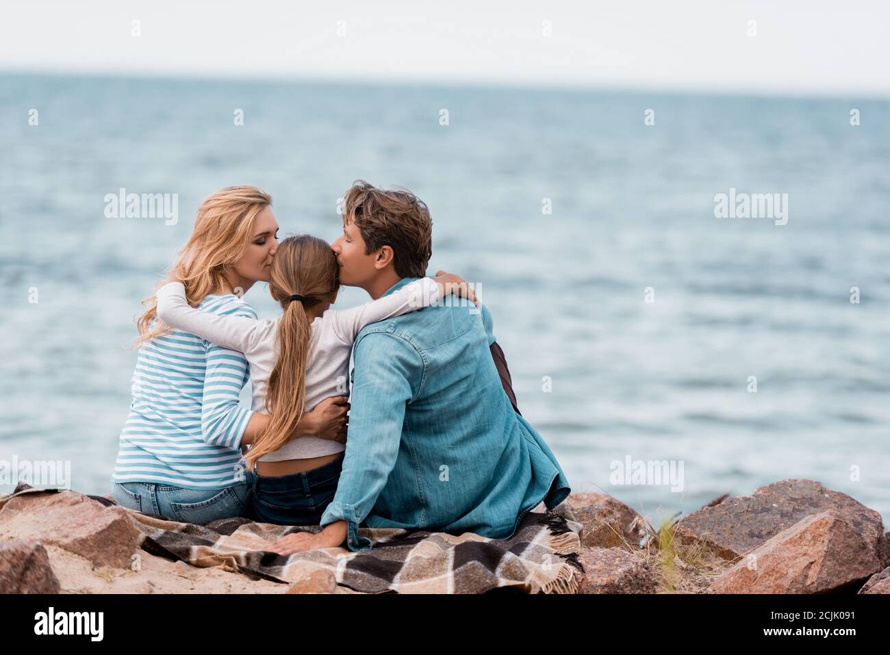 Girl kissing woman back view mother hi-res stock photography and images ...