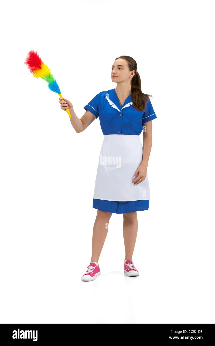 Dreamful. Portrait of female made, housemaid, cleaning worker in white ...