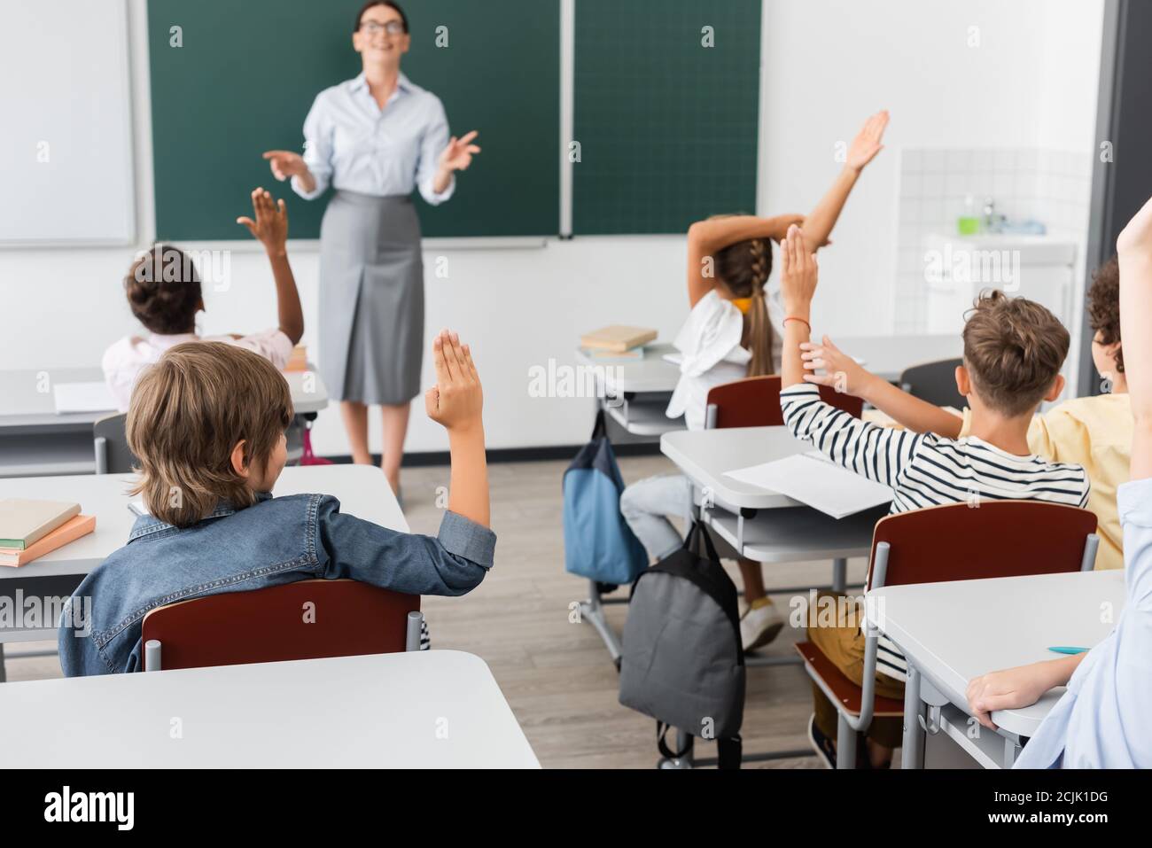 Girl classroom back view hi-res stock photography and images - Alamy