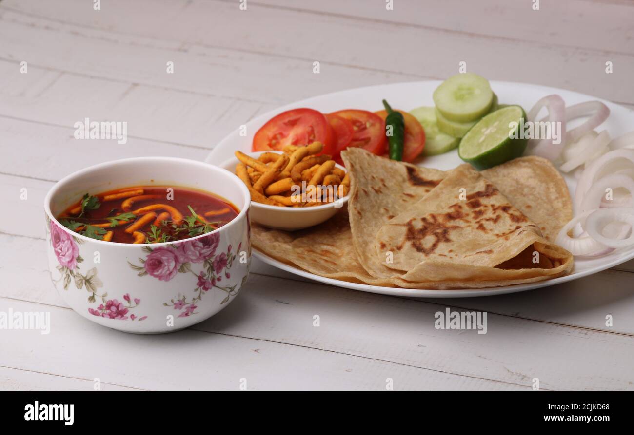 Dhaba style Sev bhaji/sabzi/curry made in tomato curry with gathiya ...