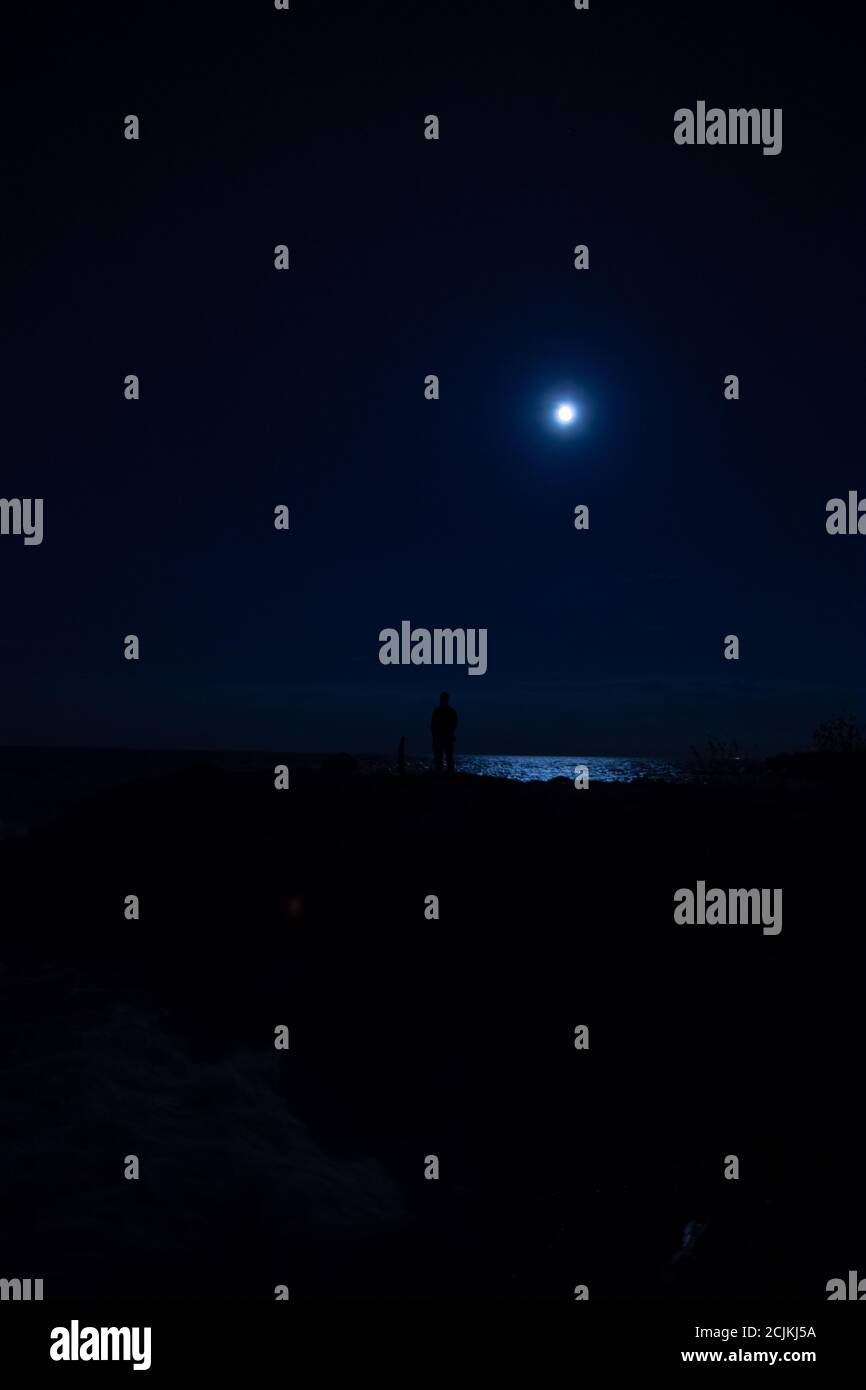Beautiful scenery of the full moon over a landscape Stock Photo - Alamy