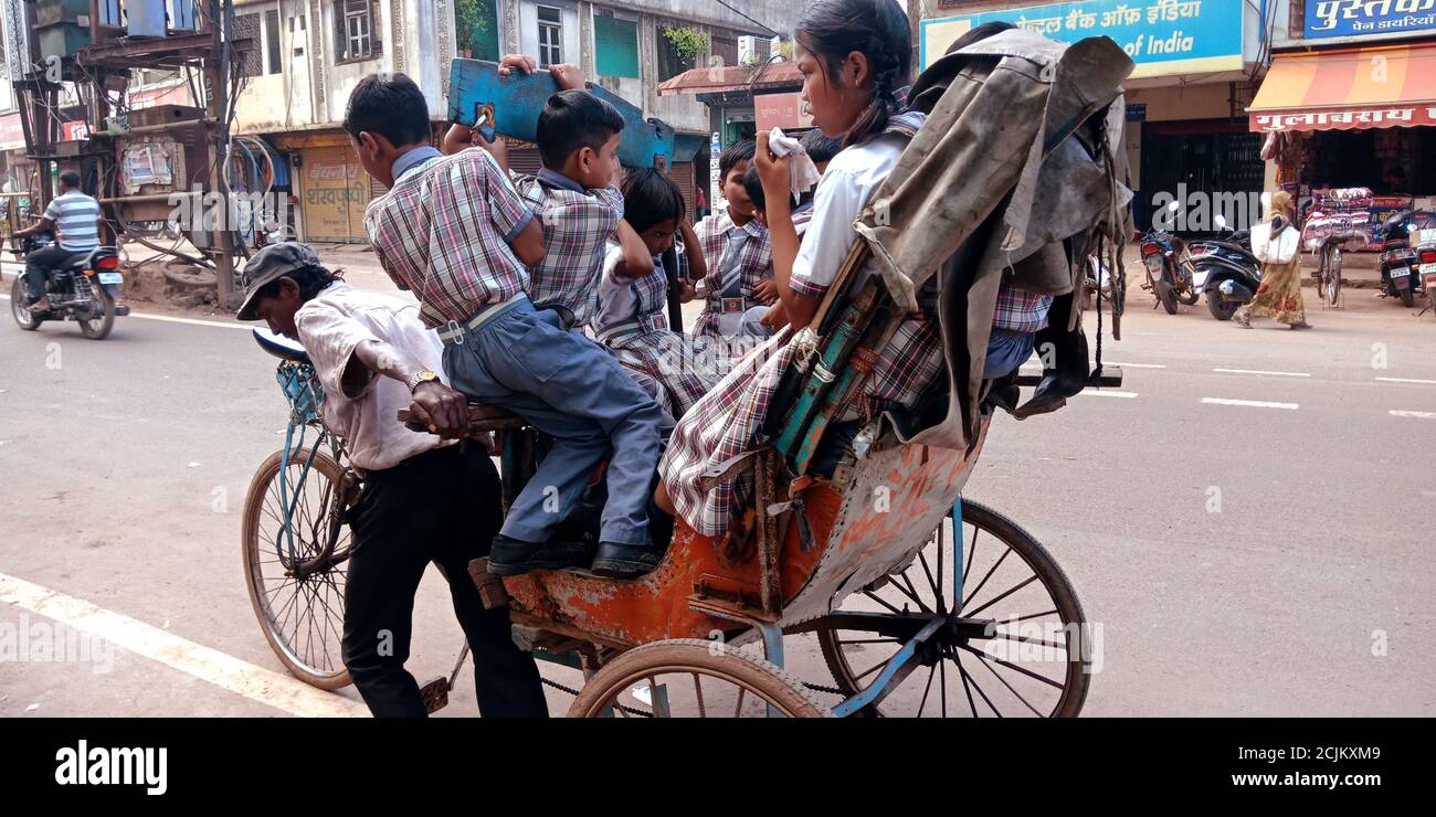 DISTRICT KATNI, INDIA - OCTOBER 05, 2019: Indian school kids sitting on ...