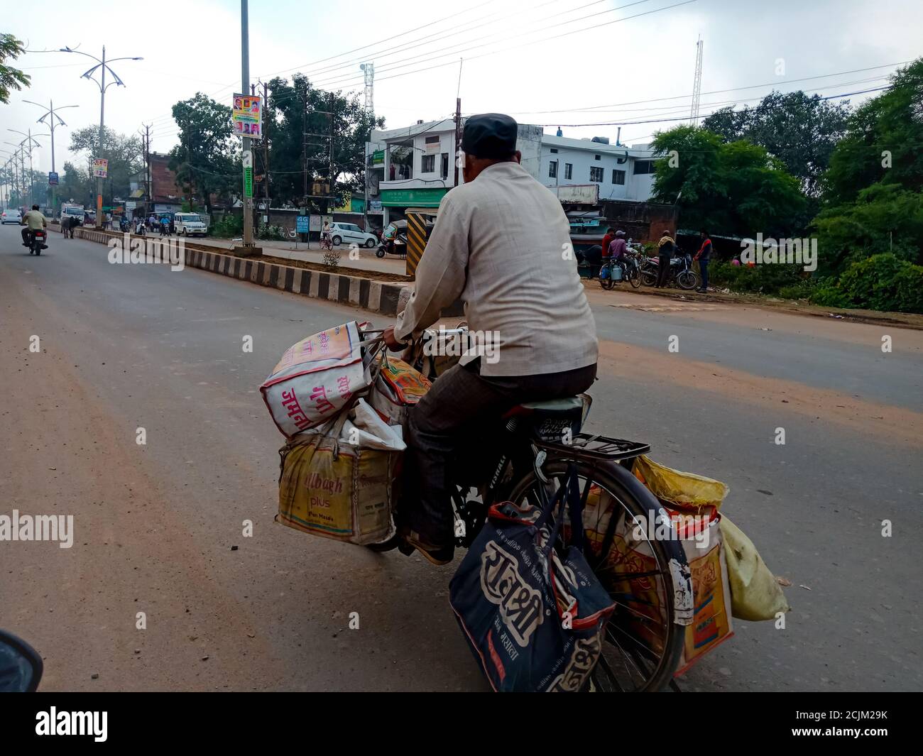 DISTRICT KATNI, INDIA - OCTOBER 06, 2019: An indian bicycle rider ...