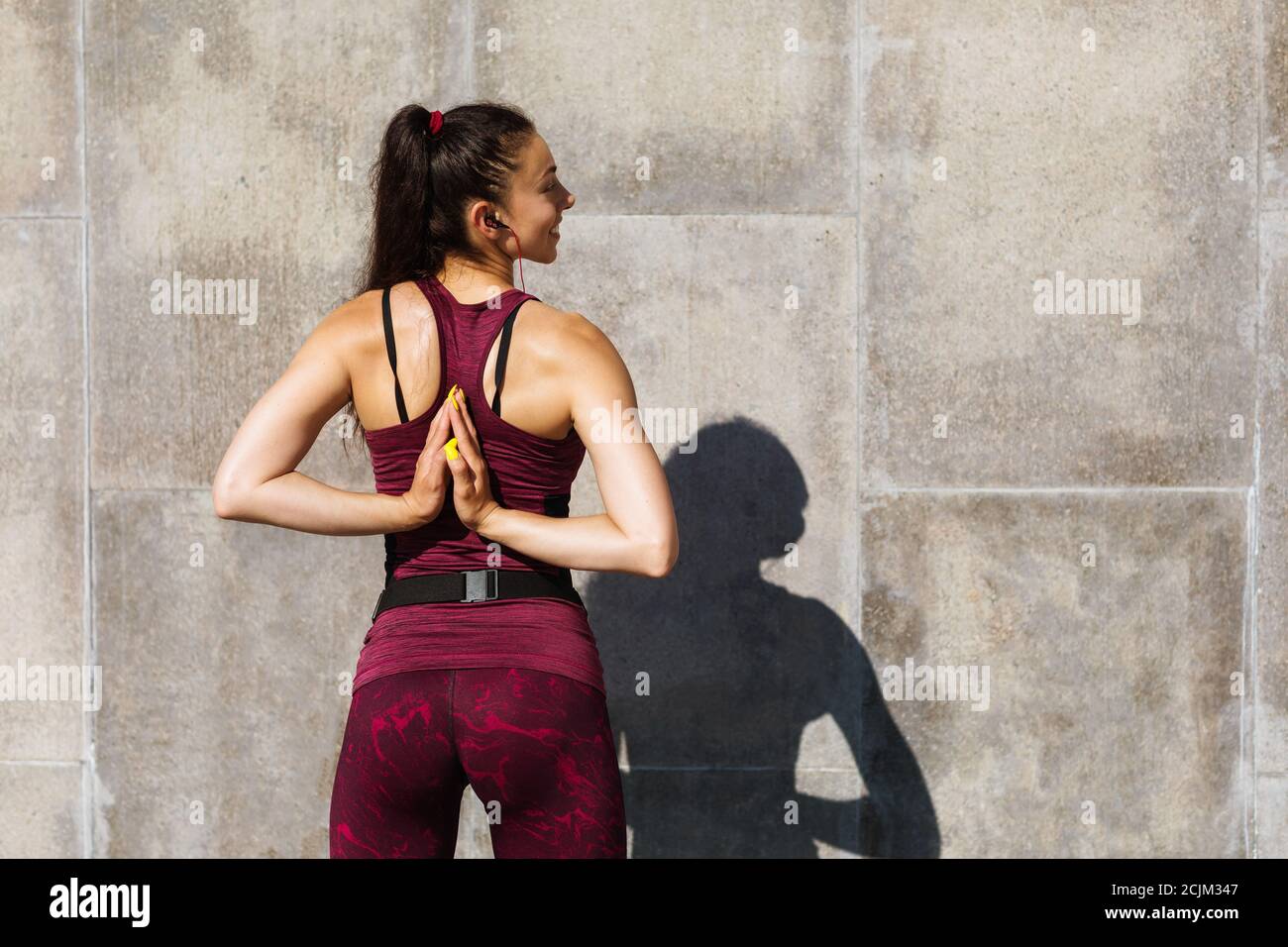 Woman hands behind back exercise hi-res stock photography and images ...