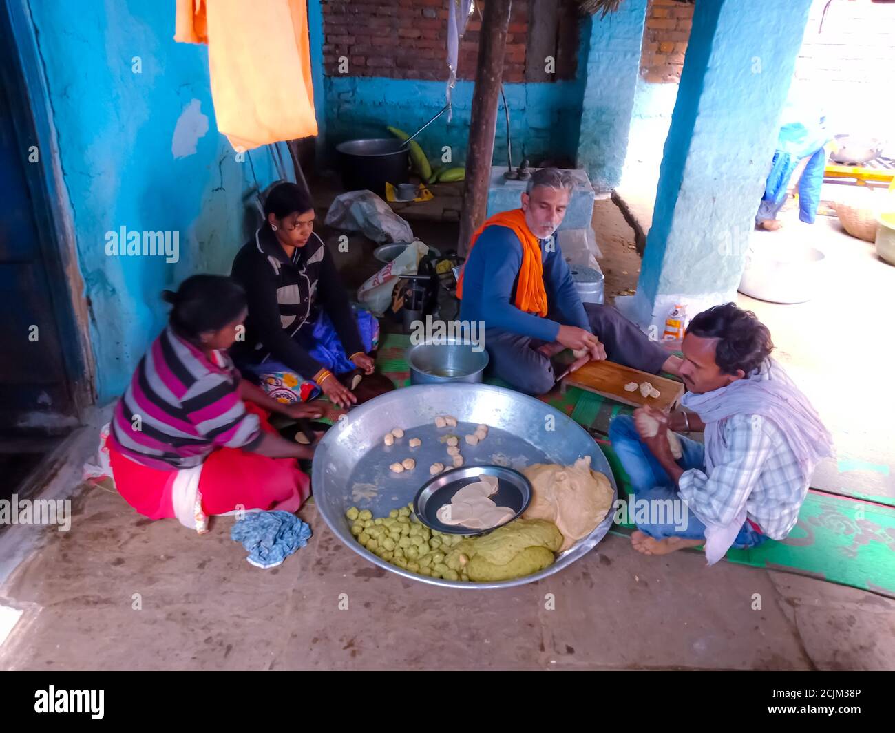 DISTRICT KATNI, INDIA - OCTOBER 06, 2019: Group of people cooking ...