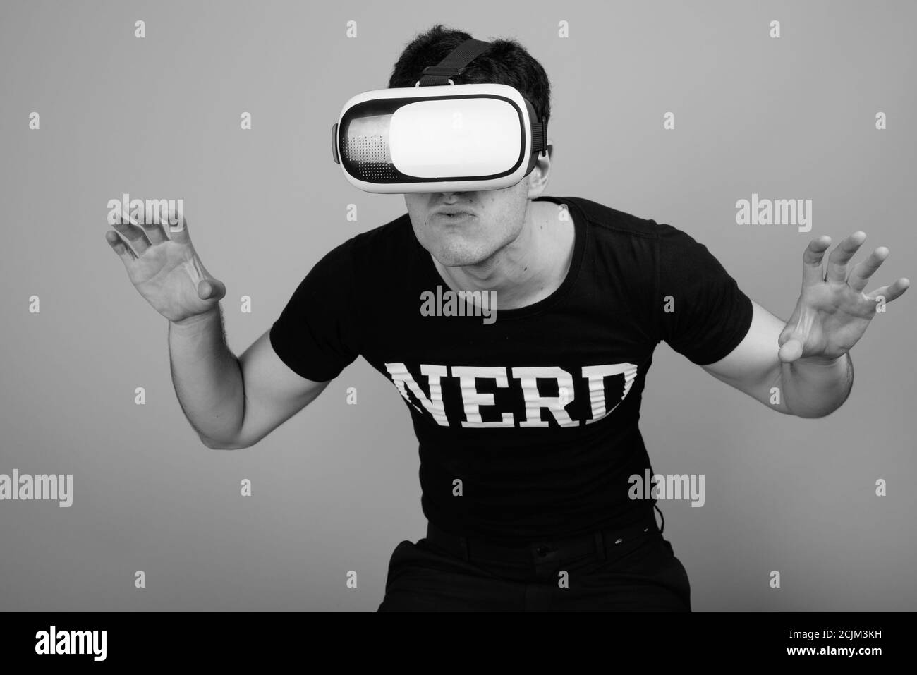 Handsome man wearing vr headset Black and White Stock Photos & Images ...