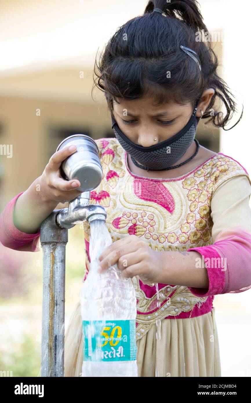 Dehradun, Uttarakhand/India - September 10 2020: A Cute girl filling ...